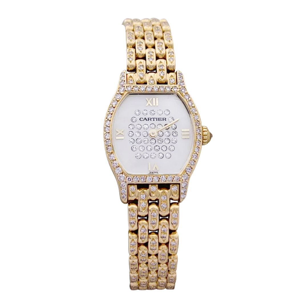 Cartier "Turtle" watch in yellow gold, diamonds, mother-of-pearl.